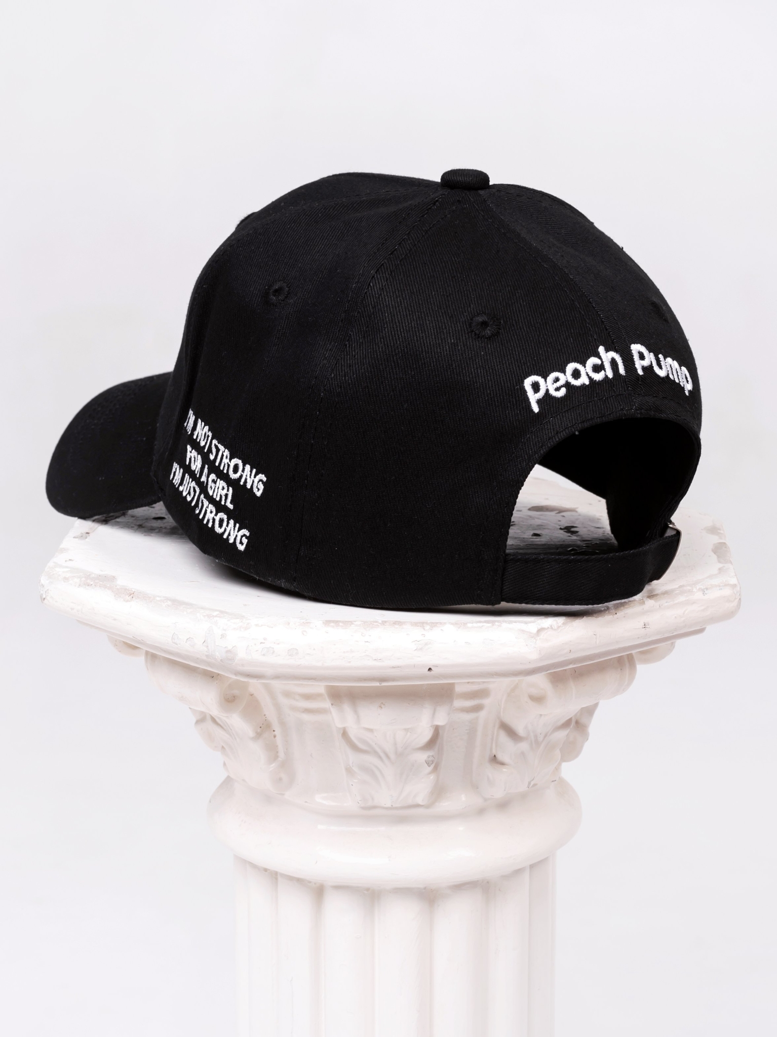 Black baseball cap with visor and Peach Pump logo - Peach Pump